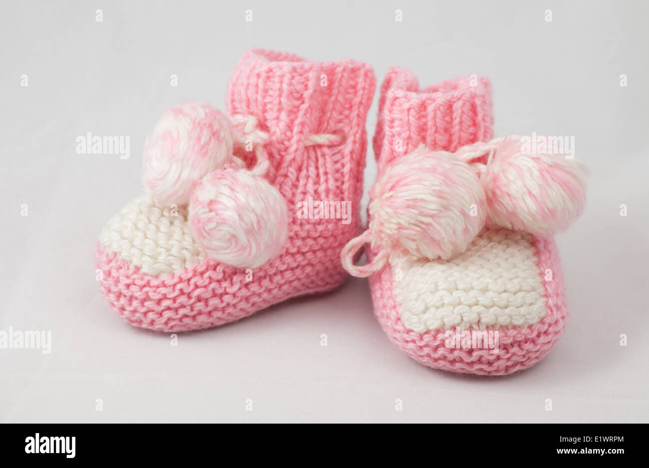 pink baby's bootees Stock Photo - Alamy