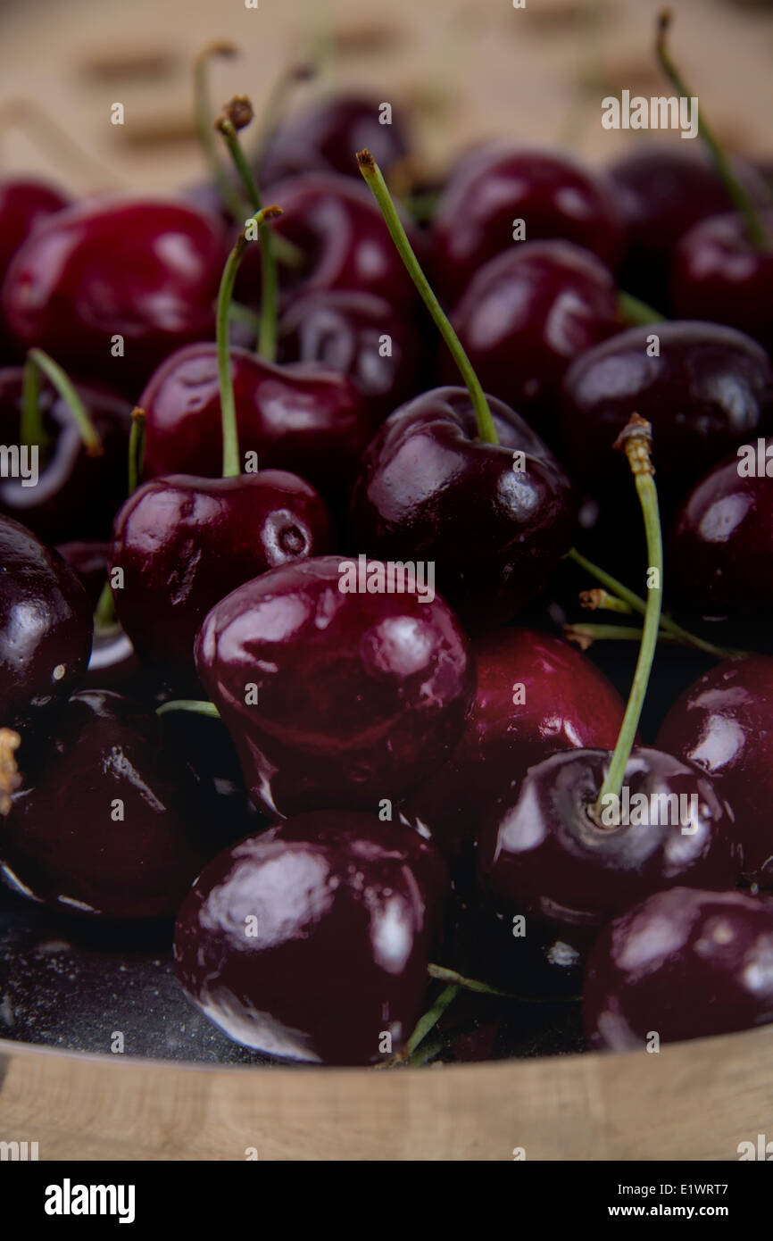 Dish of black cherries Stock Photo - Alamy