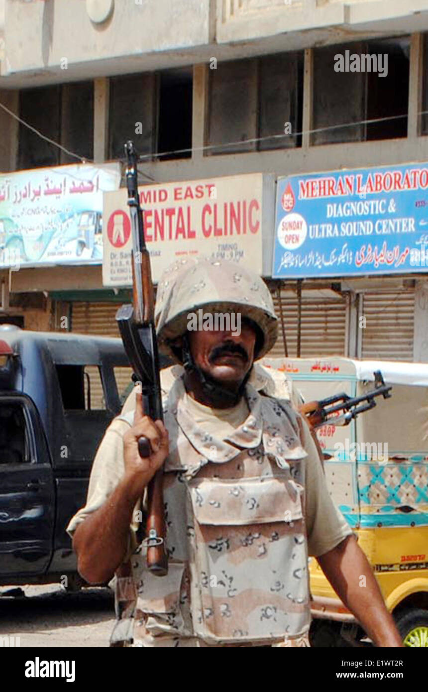 Karachi, Pakistan. 10th June, 2014. A Pakistani security personnel ...