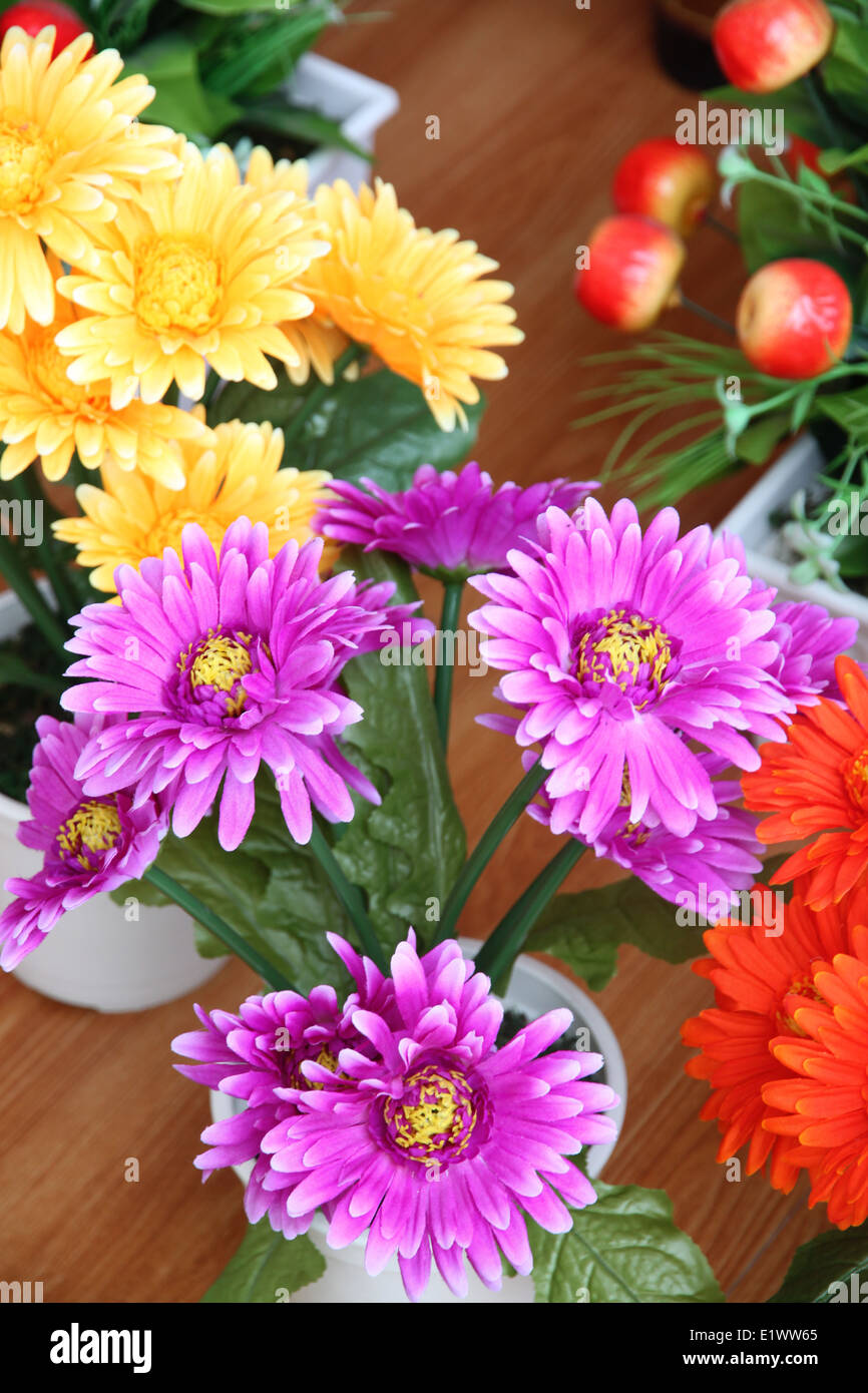 Colorful of artificial flowers for background Stock Photo - Alamy