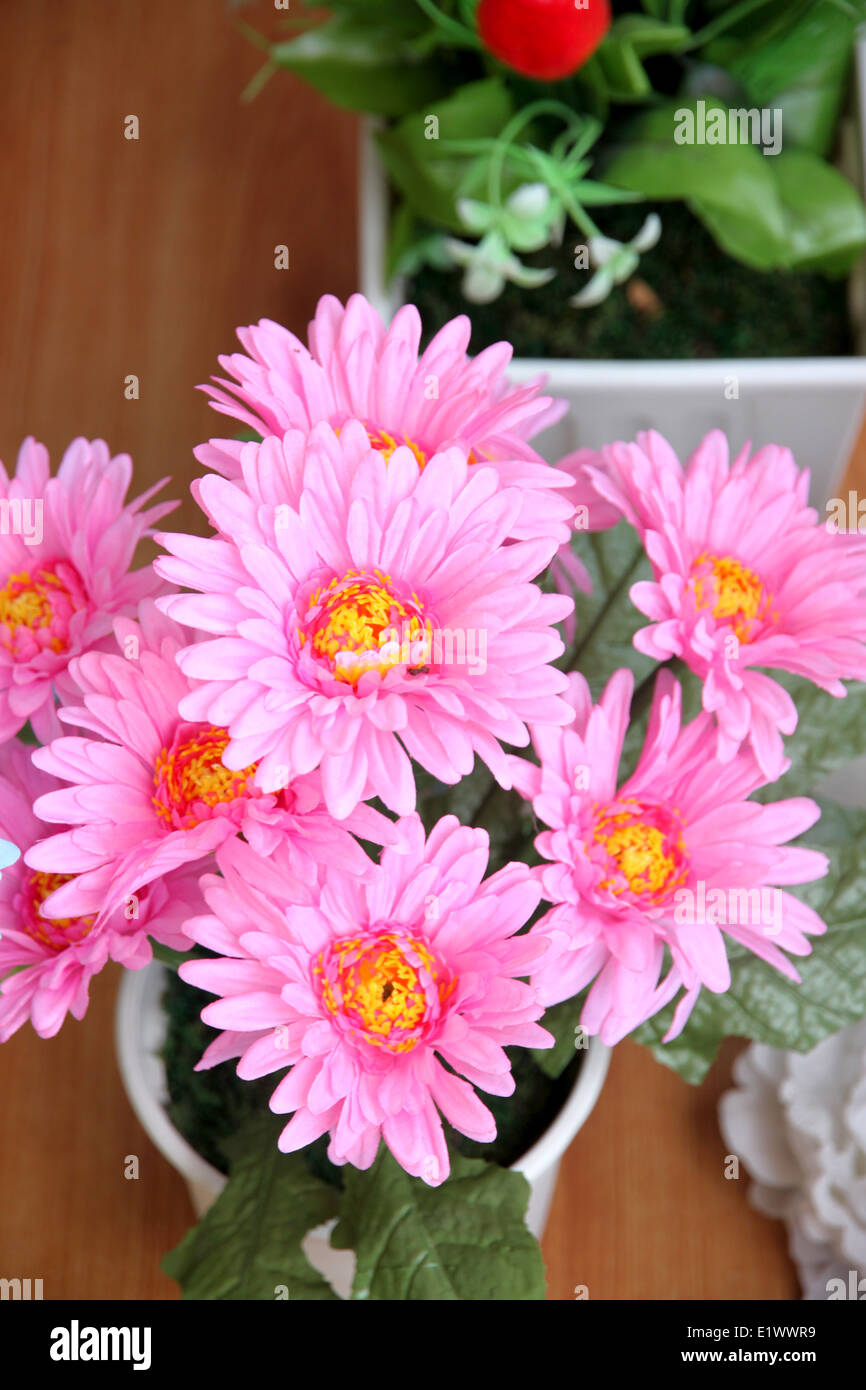 Colorful of artificial flowers for background Stock Photo - Alamy