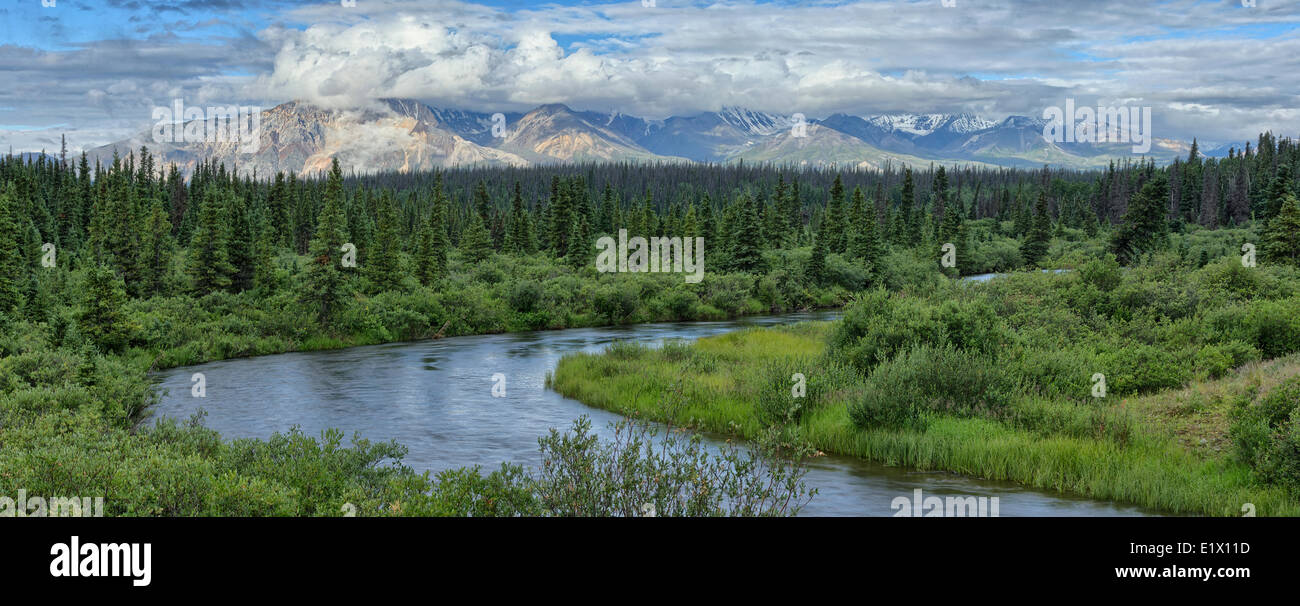 The Jarvis River flows towards the St. Elias mountains in Kluane ...