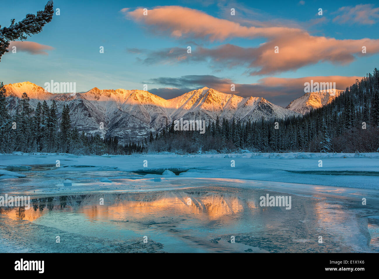 The last rays sunlight hit Gray Ridge the clouds they are reflected in ...