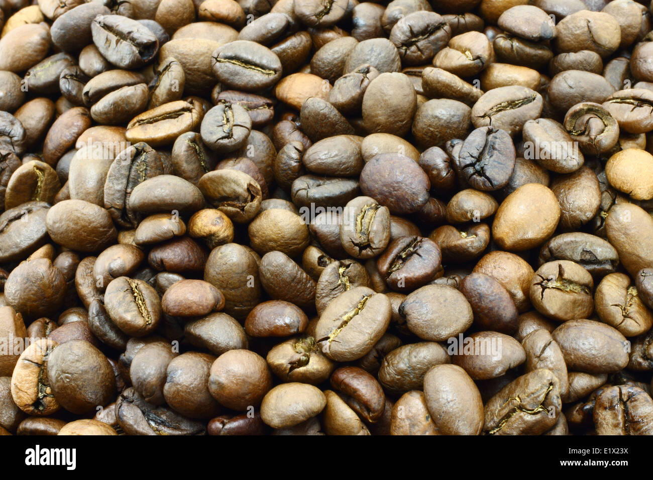 Coffee beans texture close-up for background Stock Photo - Alamy