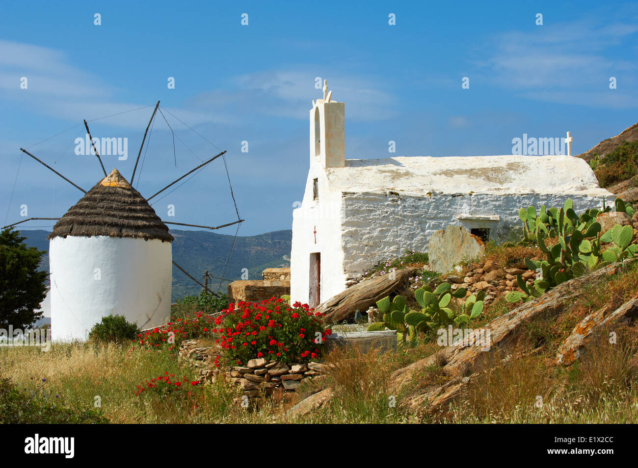 Greece, Cyclades, Ios island, church and windmill near Chora Stock ...