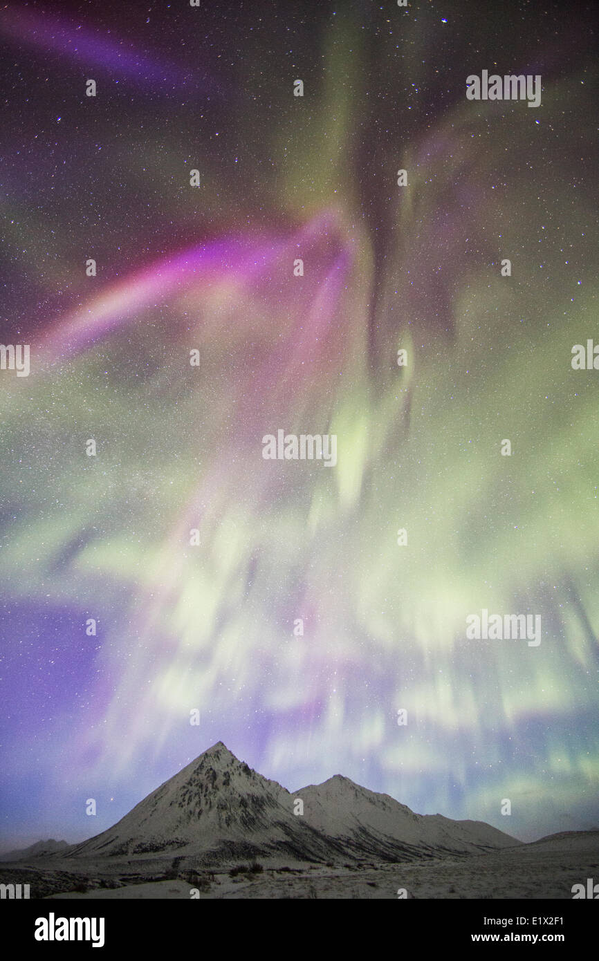 Northern lights or aurora borealis above the snow covered tundra along ...