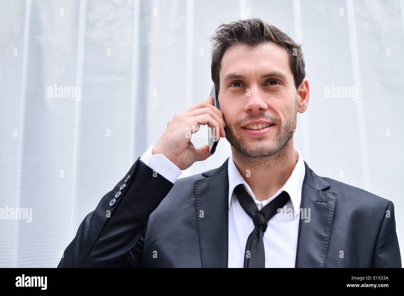 Businessman using cell phone Stock Photo - Alamy