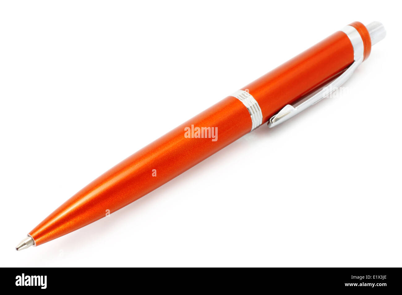 Orange ball pen on a white background Stock Photo - Alamy