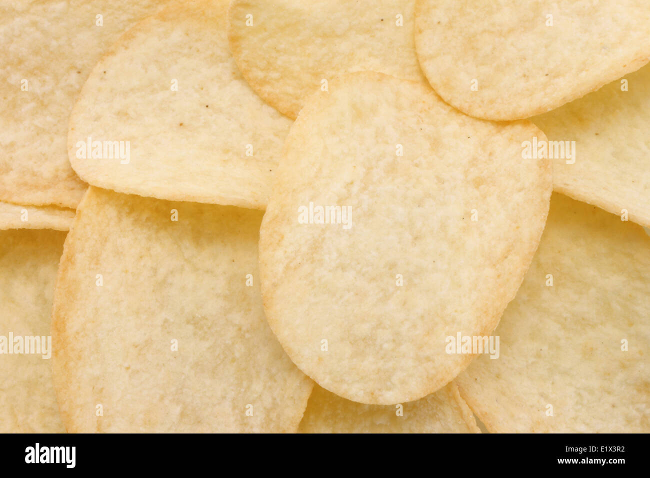 Heap of potato chips texture for background Stock Photo - Alamy