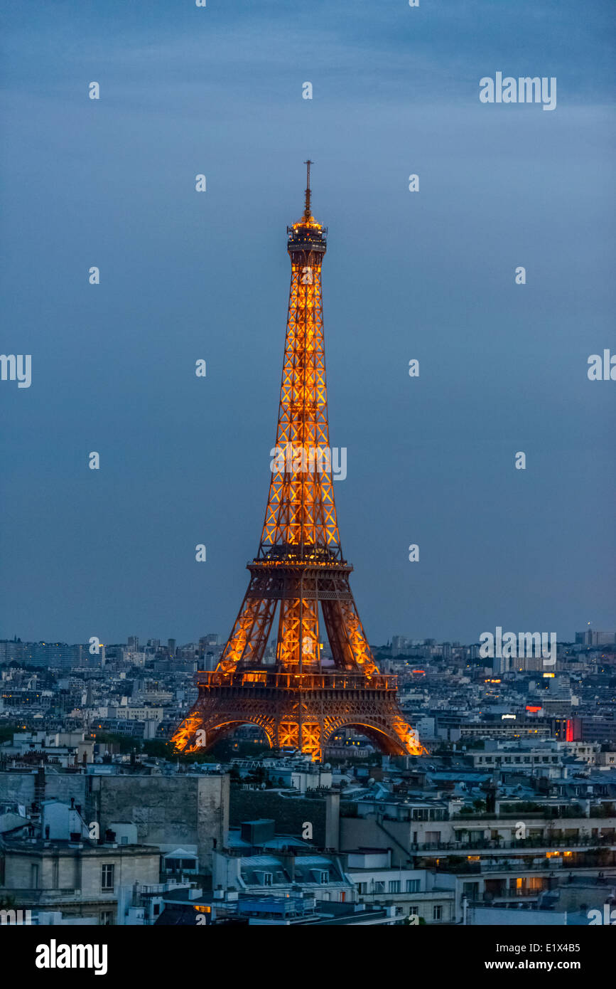 Paris - September 1: Eiffel Tower at dusk as seen from the Arc de Triomphe on September 1, 2013 ...