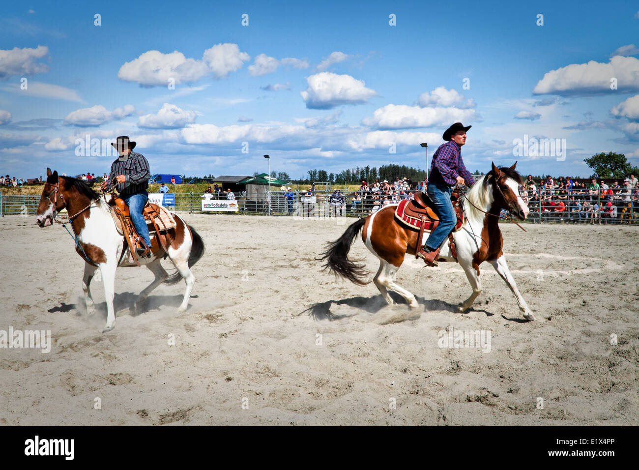 Two cowboys riding horses hi-res stock photography and images - Alamy
