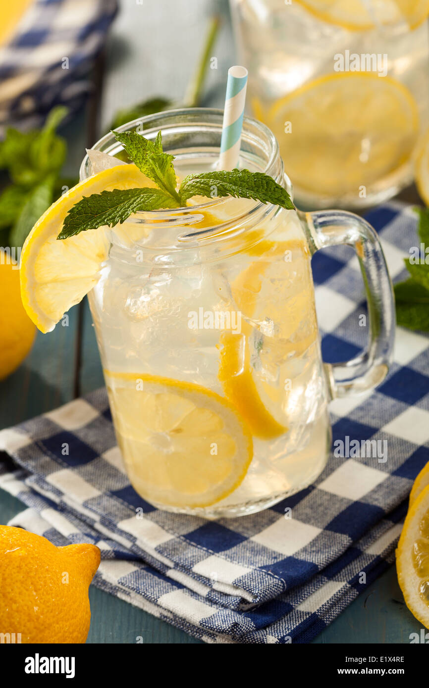 Homemade Refreshing Yellow Lemonade with Ice and Mint Stock Photo - Alamy