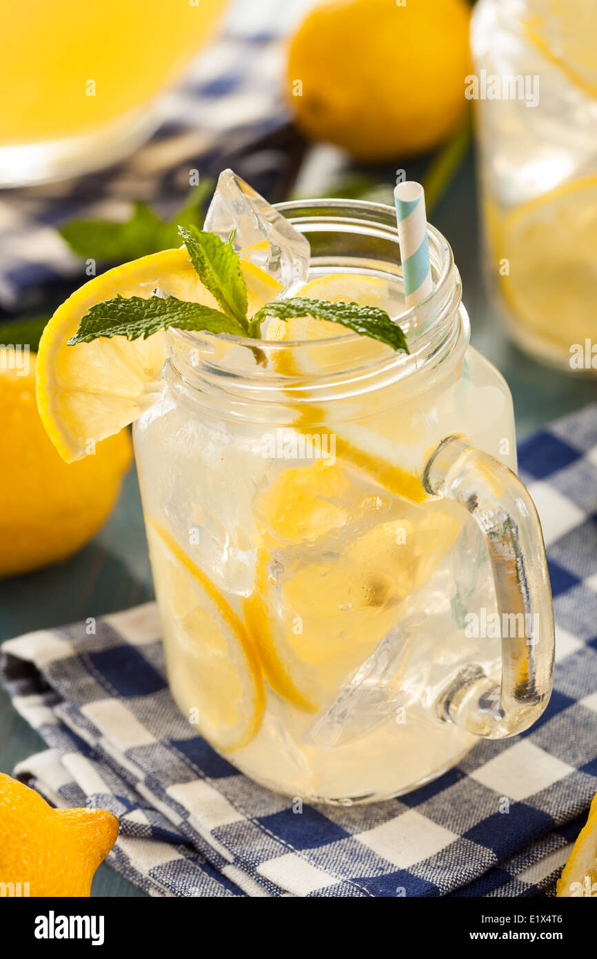 Homemade Refreshing Yellow Lemonade with Ice and Mint Stock Photo - Alamy