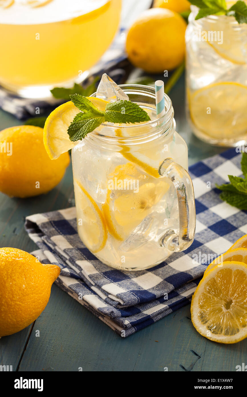 Homemade Refreshing Yellow Lemonade with Ice and Mint Stock Photo - Alamy
