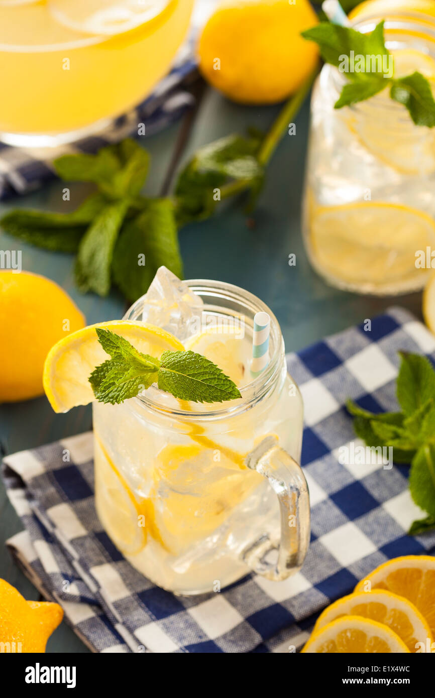 Homemade Refreshing Yellow Lemonade with Ice and Mint Stock Photo - Alamy