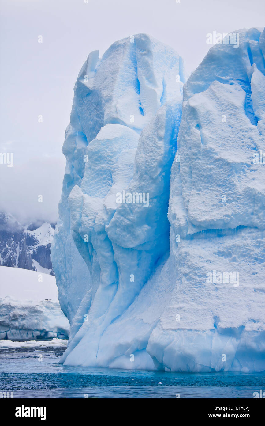Antarctic iceberg in the snow. Beautiful winter background Stock Photo ...