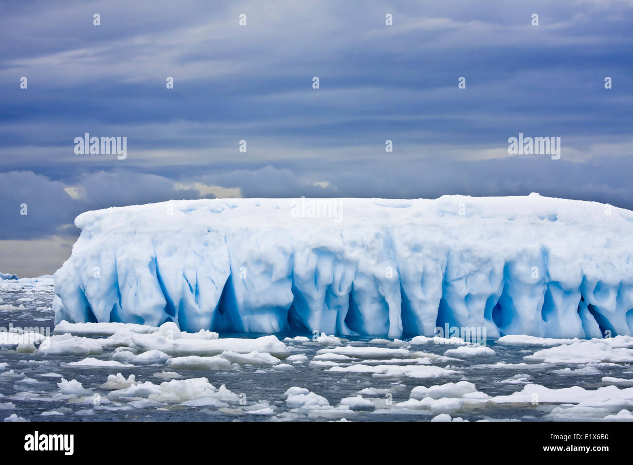 Antarctic iceberg in the snow. Beautiful winter background Stock Photo ...