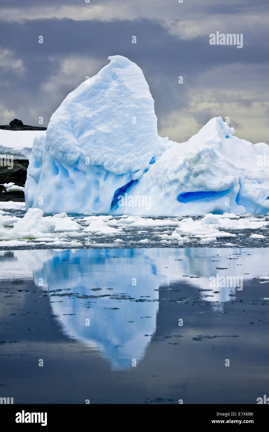 Antarctic iceberg in the snow. Beautiful winter background Stock Photo ...