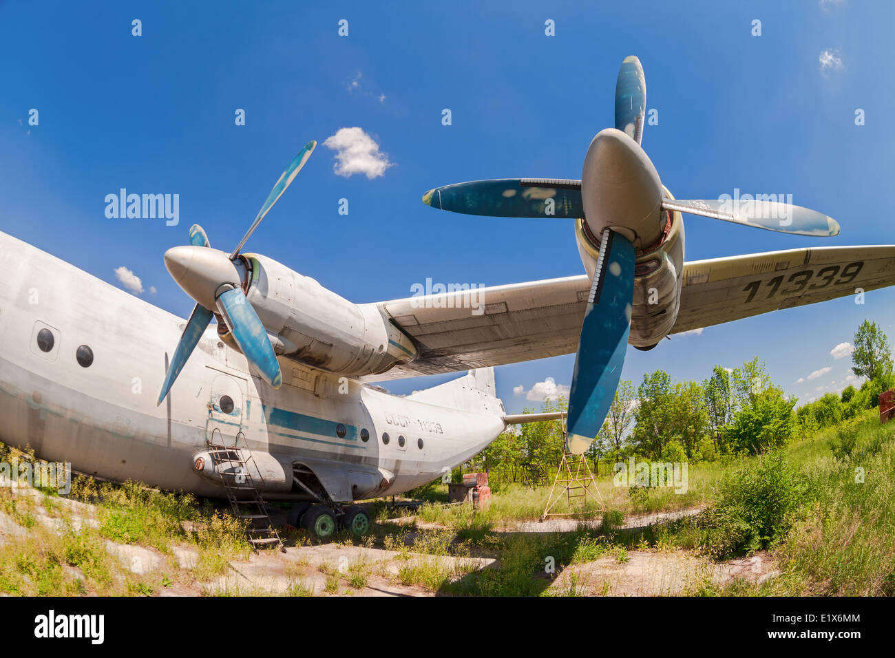 Old russian aircraft An-12 at an abandoned aerodrome Stock Photo - Alamy