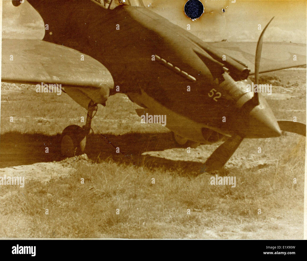 This image captures the Curtiss Hawk 81, a variant of the P-40 Warhawk ...
