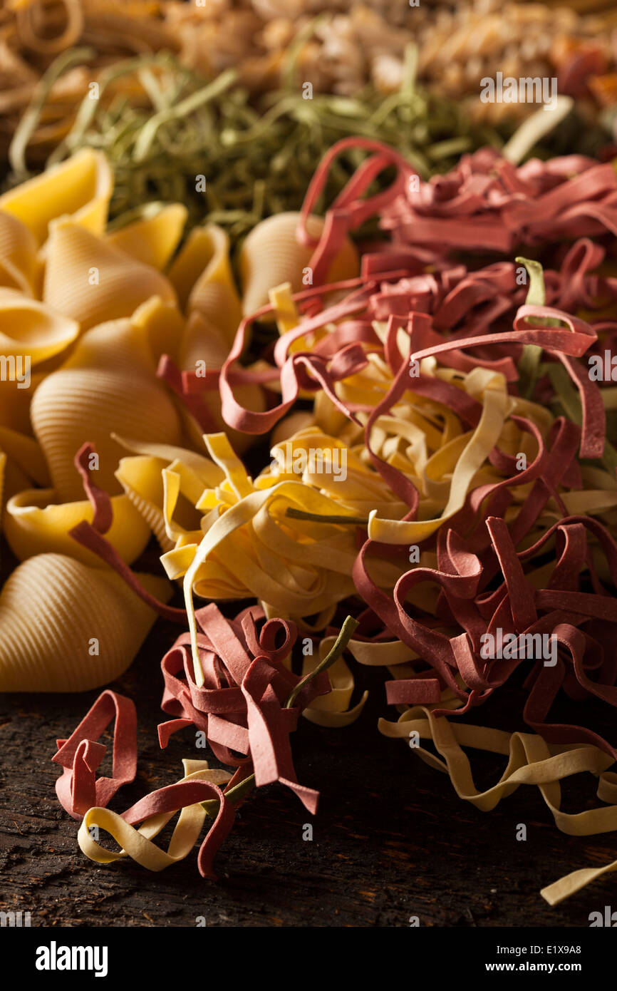 Assorted Homemade Dry Italian Pasta on a Background Stock Photo - Alamy