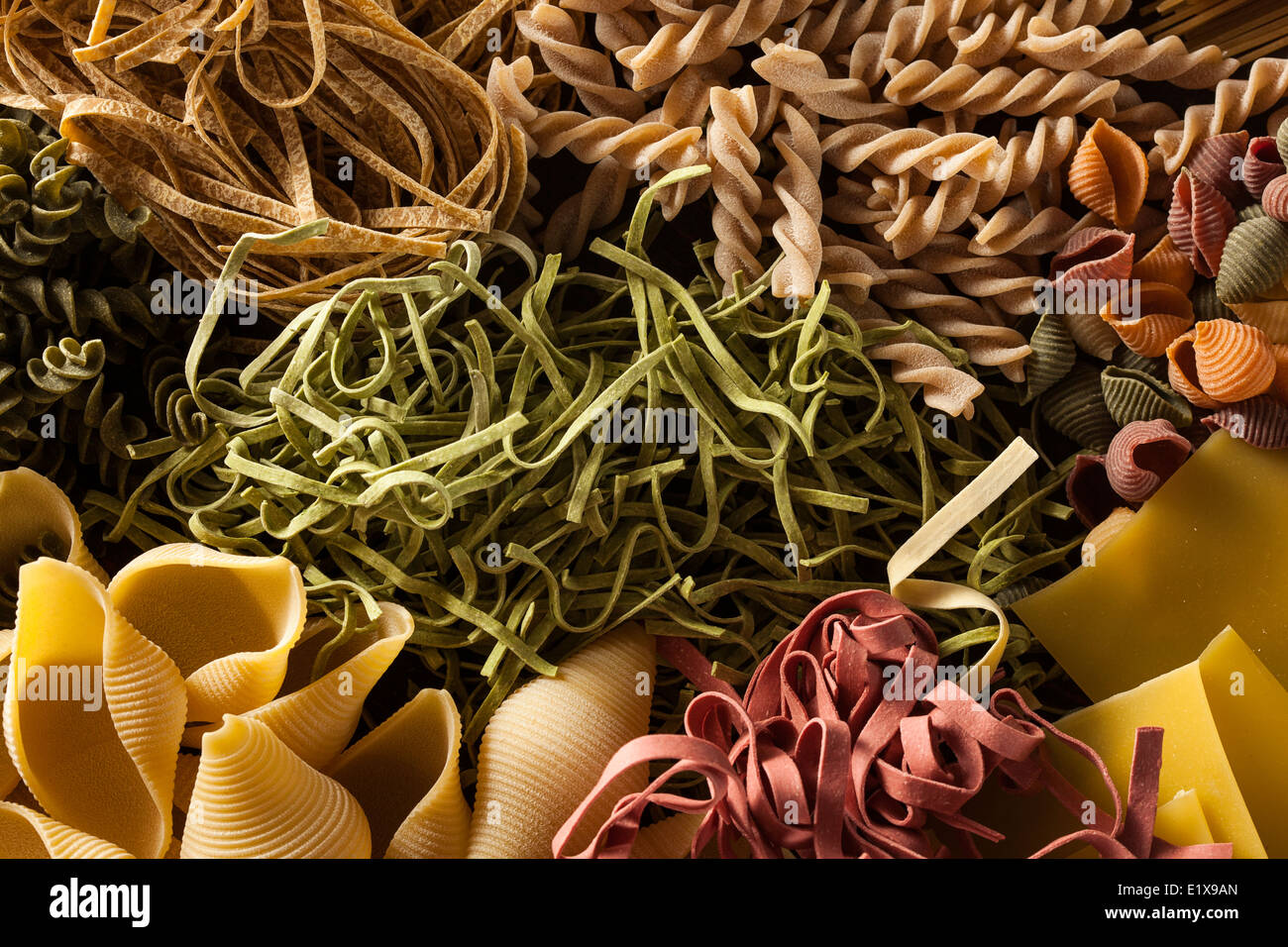 Assorted Homemade Dry Italian Pasta on a Background Stock Photo - Alamy