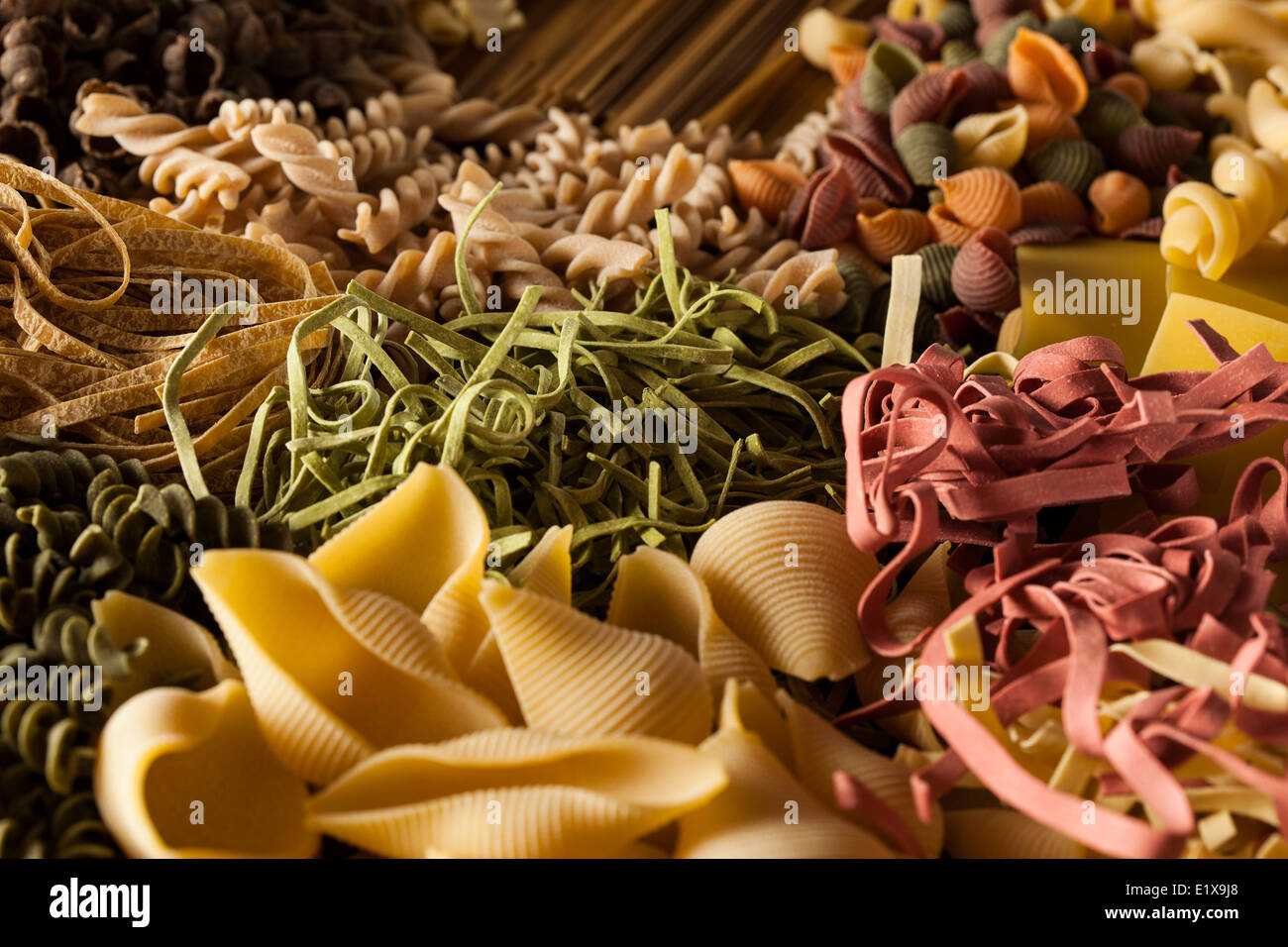 Assorted Homemade Dry Italian Pasta on a Background Stock Photo - Alamy