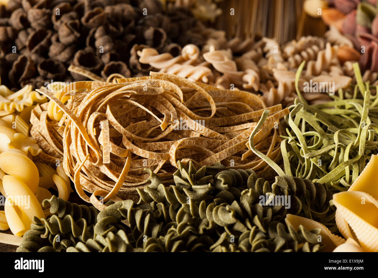 Assorted Homemade Dry Italian Pasta on a Background Stock Photo - Alamy