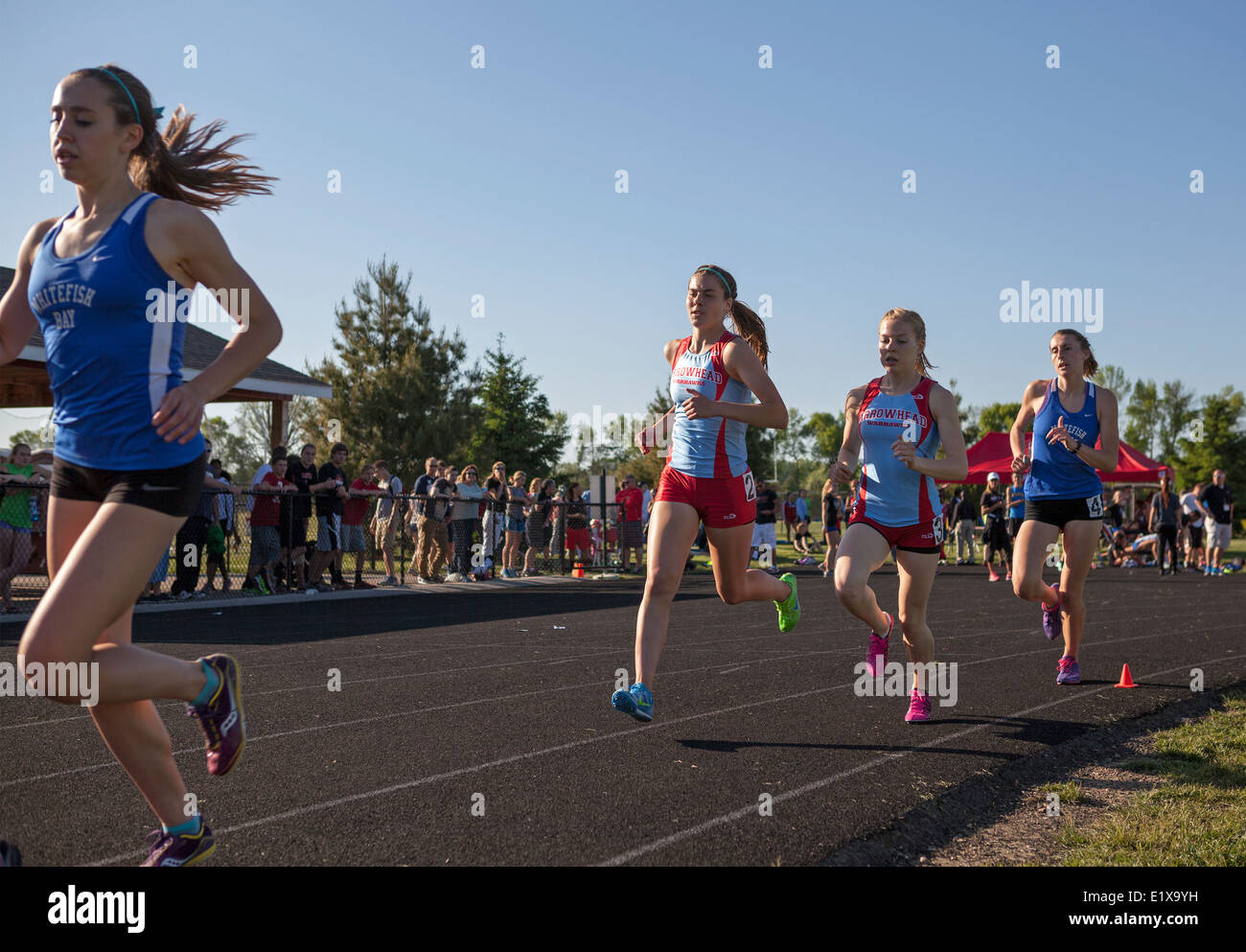 High school athletes compete in a track and field meet in Milwaukee ...