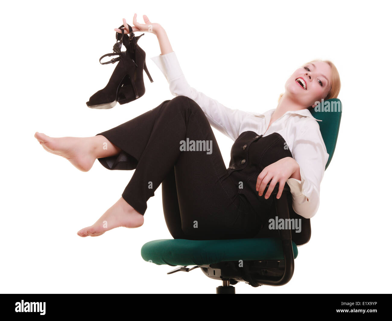 Break from work. Businesswoman relaxing on chair Stock Photo - Alamy