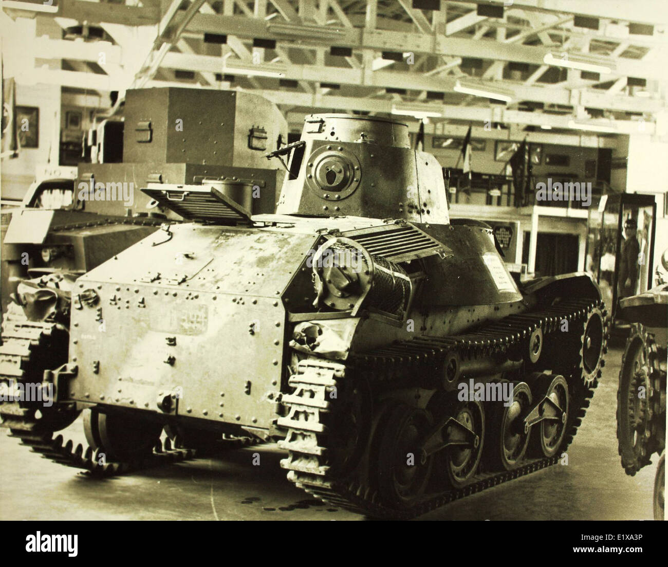 This image showcases a Type 95 tank on display at a museum, a light ...