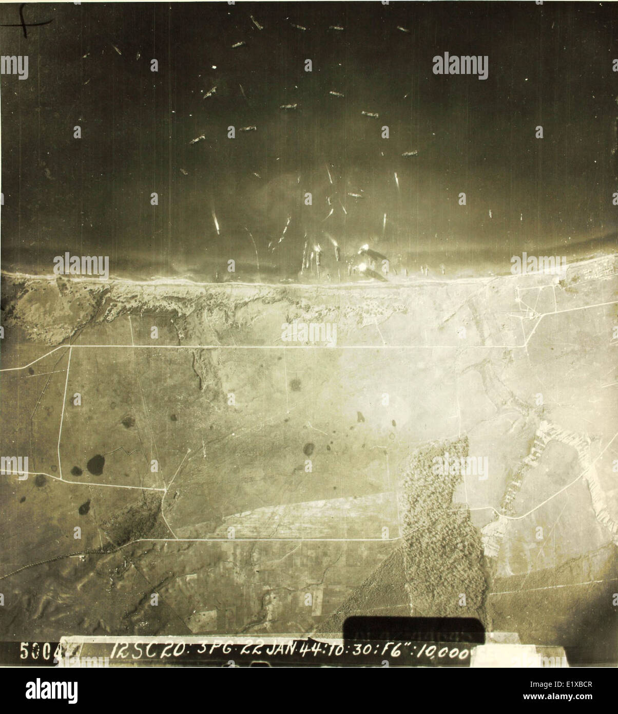 This aerial reconnaissance photograph shows the invasion of Anzio ...