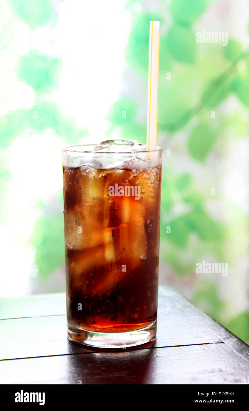 cola drink in glass on the foods table Stock Photo - Alamy