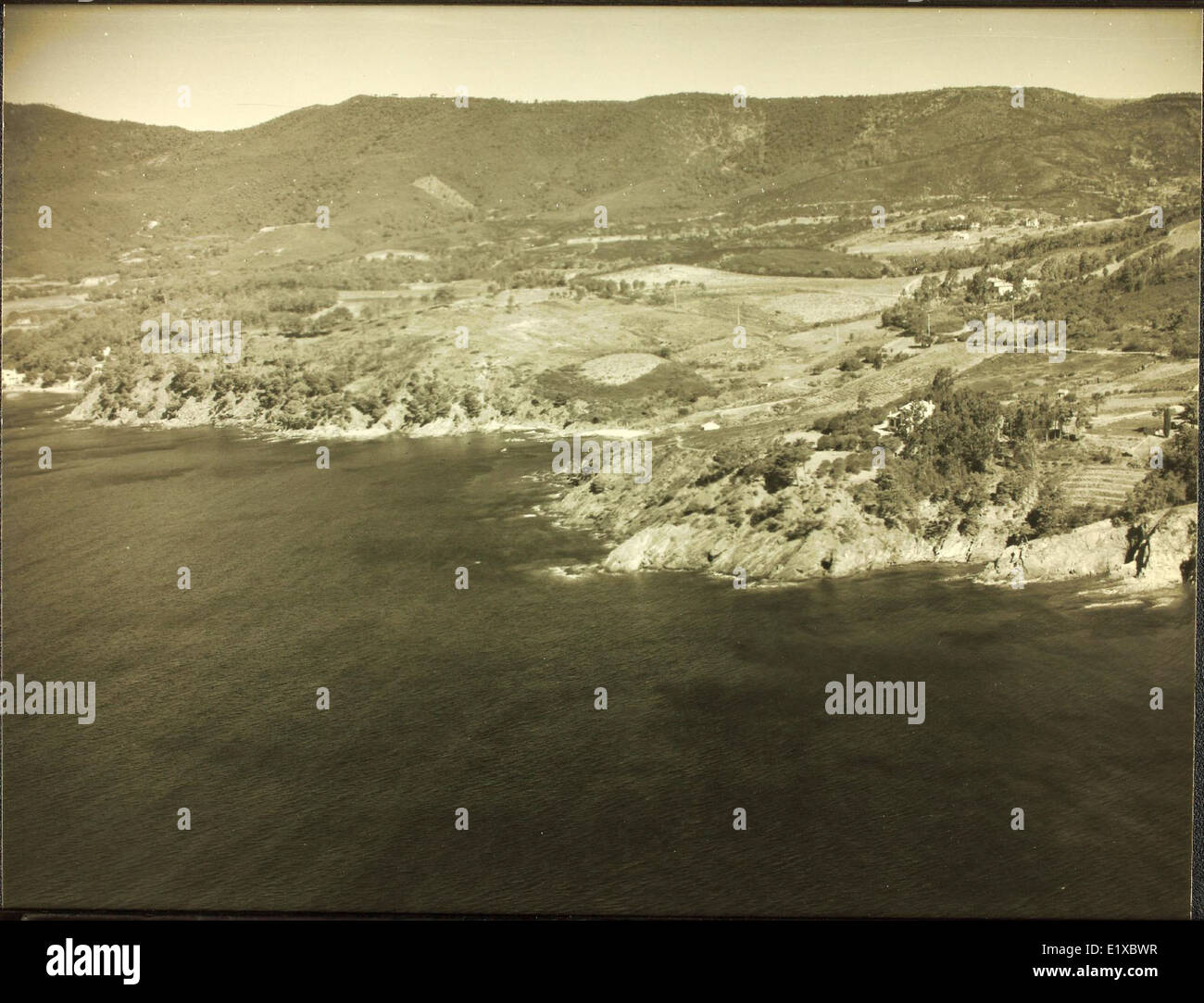 This reconnaissance aerial photo from the World War II era captures a ...