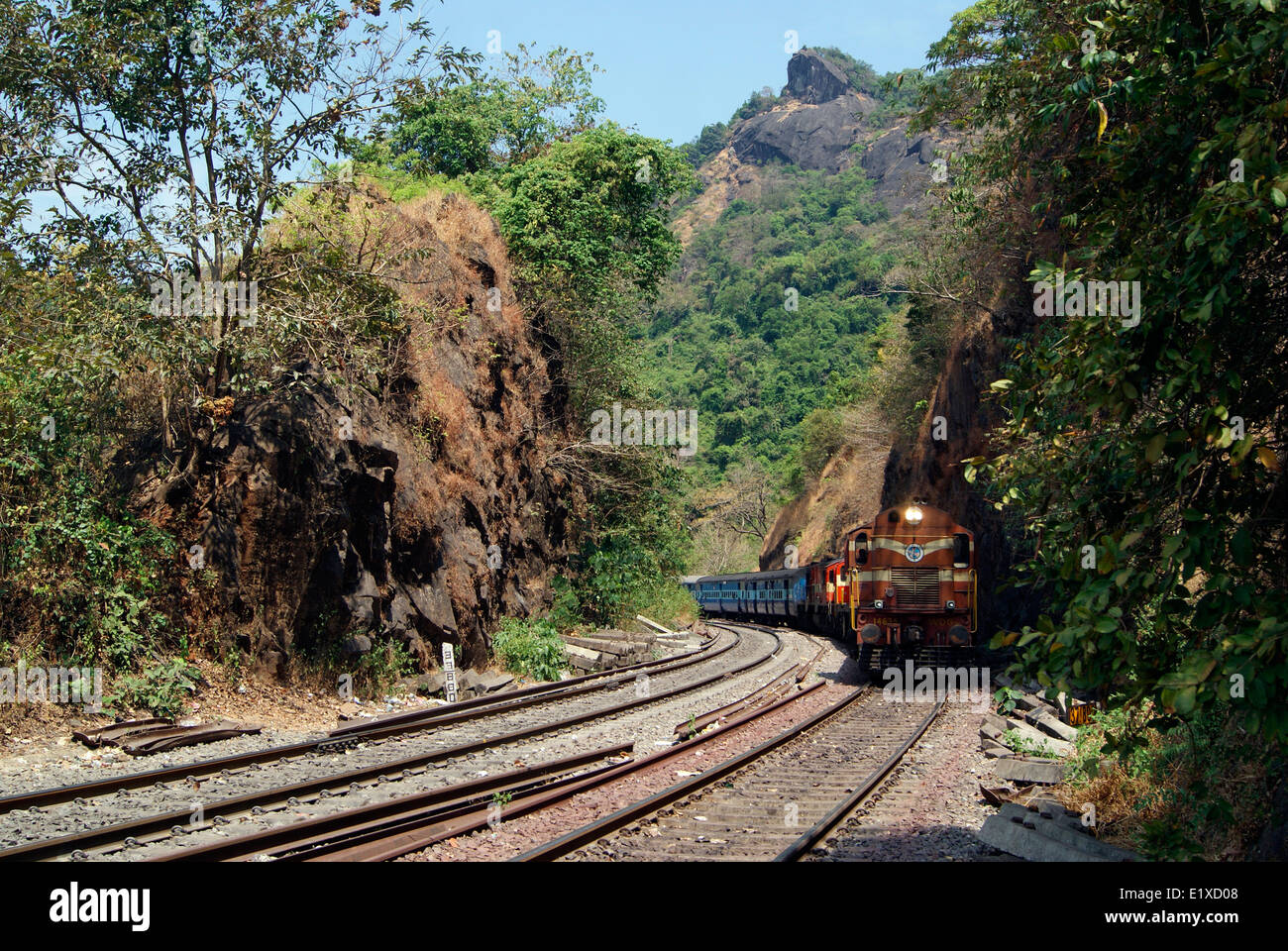 Indian Railway Diesel Train Passing through Western Ghats mountains at ...