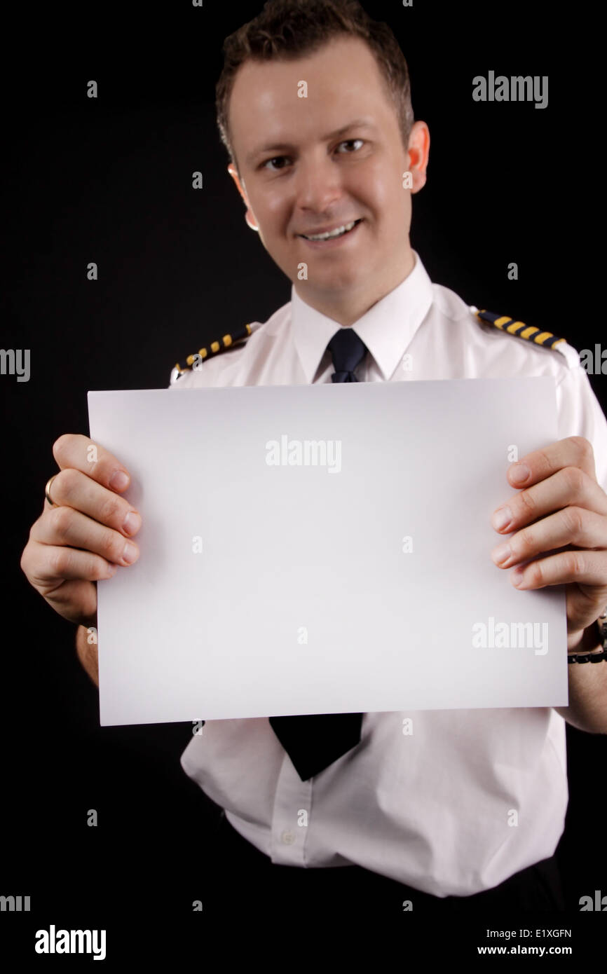 The pilot holding a card for Your sample text Stock Photo - Alamy