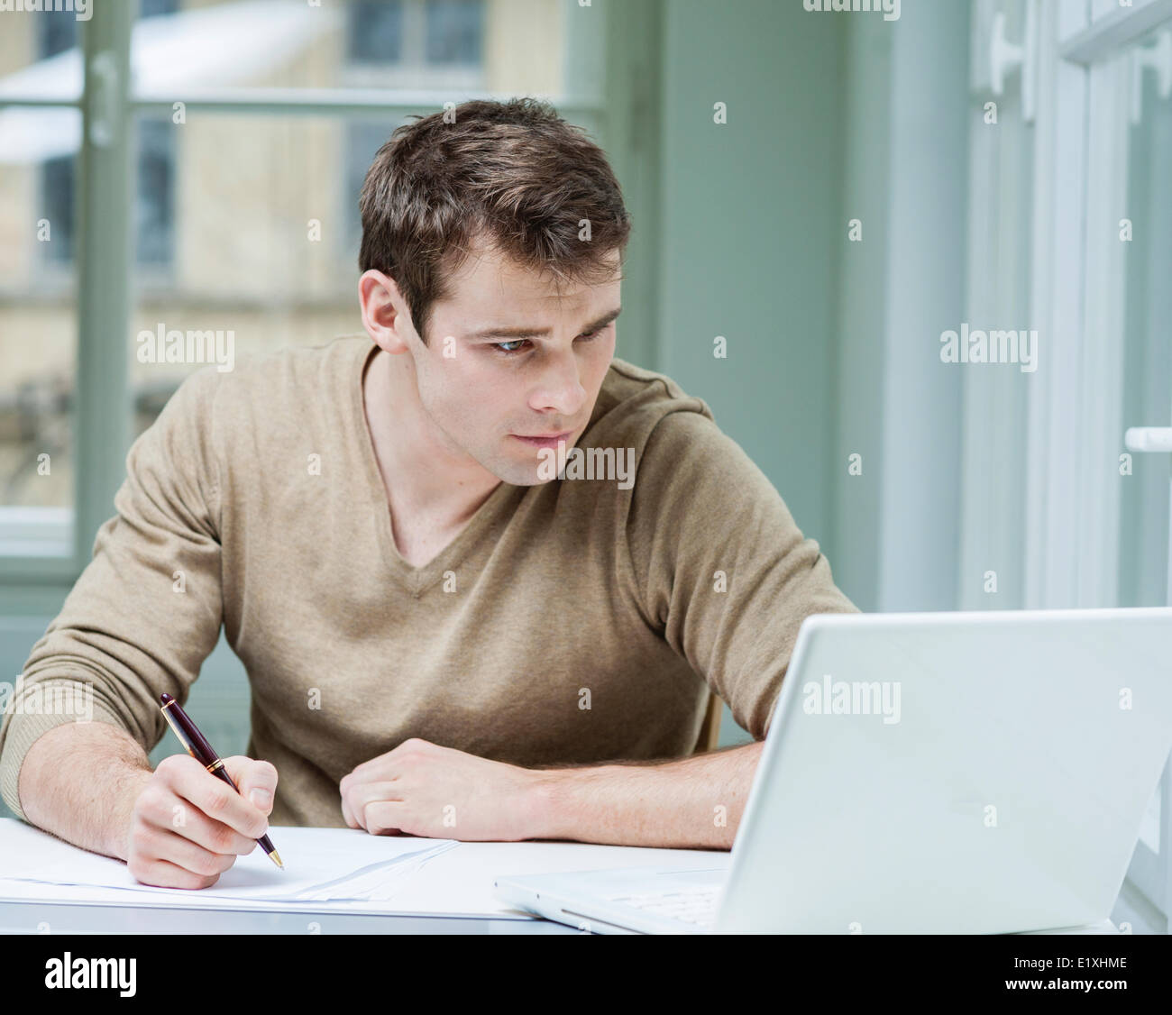Male office laptop writing hi-res stock photography and images - Alamy