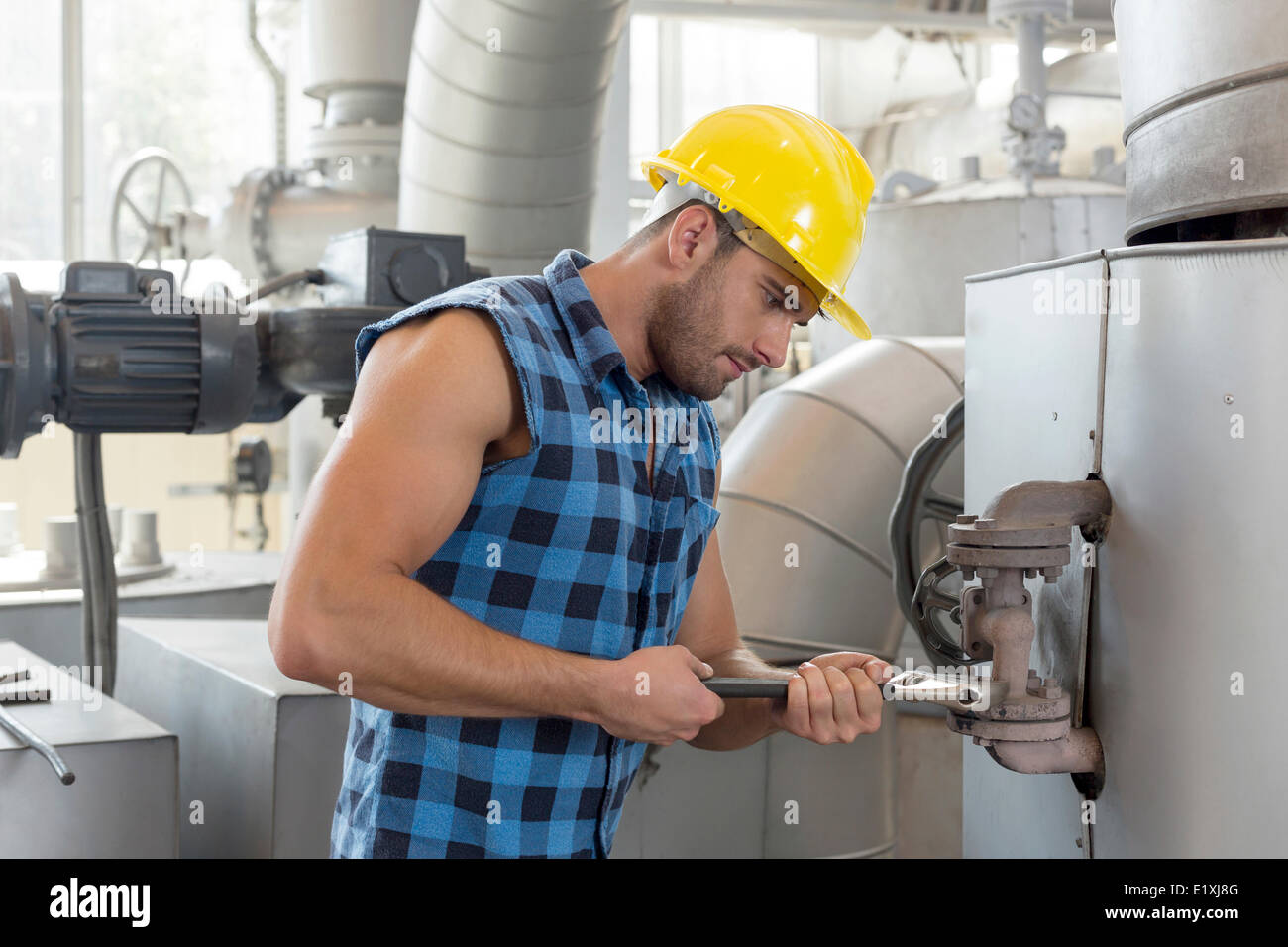 Worker Working On Factory Machines High Resolution Stock Photography ...