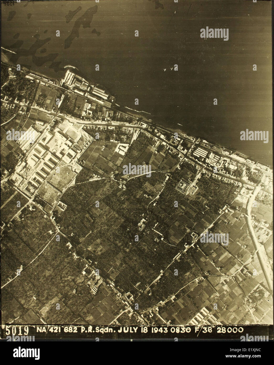 This aerial reconnaissance photo captures the city of Naples, Italy ...