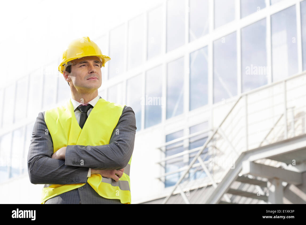Man wear vest crossed arms hi-res stock photography and images - Alamy