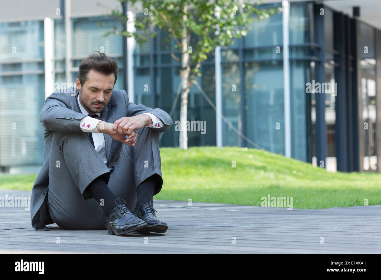 Man sitting down on path hi-res stock photography and images - Alamy