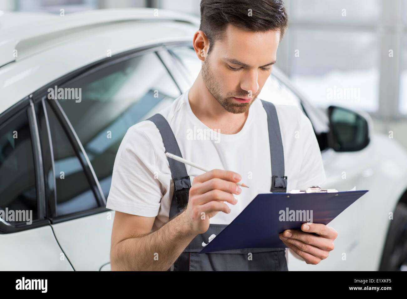 Young male engineer working hi-res stock photography and images - Alamy