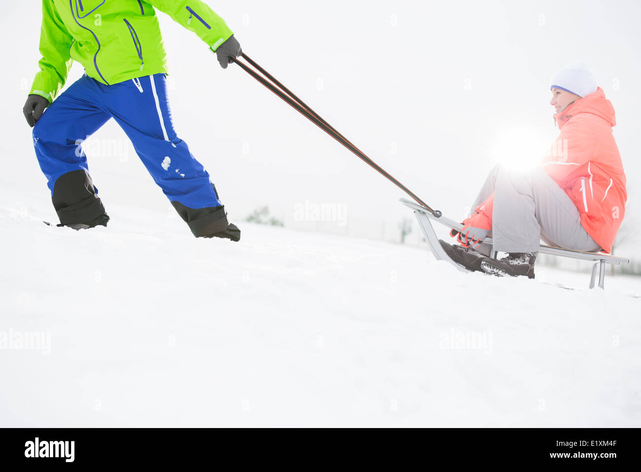 Men sled vehicle in snow hi-res stock photography and images - Alamy
