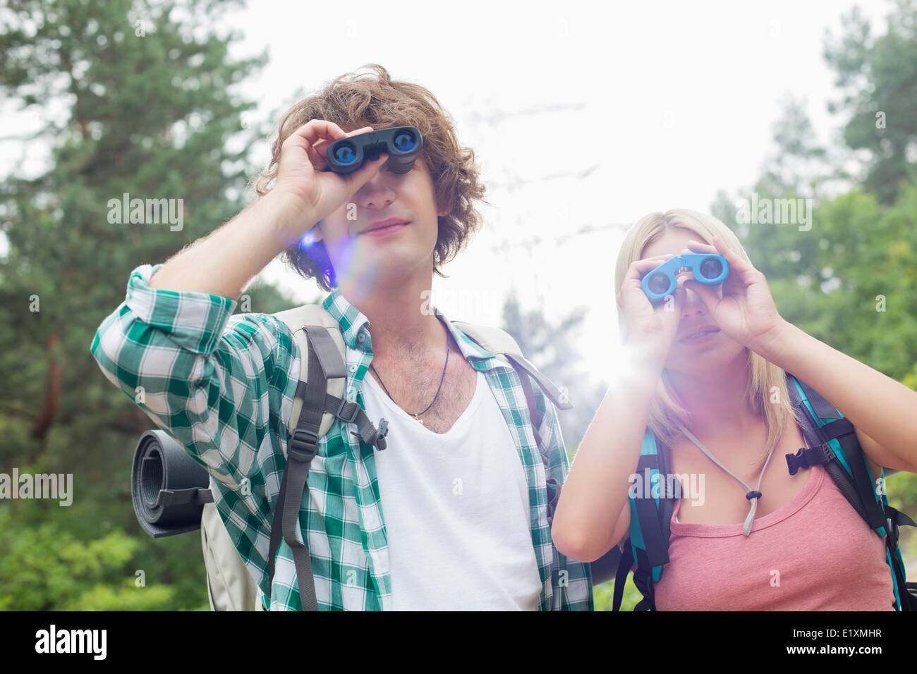 Using binoculars young hi-res stock photography and images - Alamy