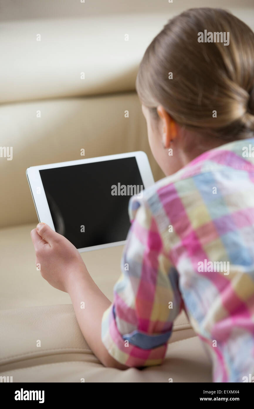 Pre teen girl looking using computer hi-res stock photography and ...