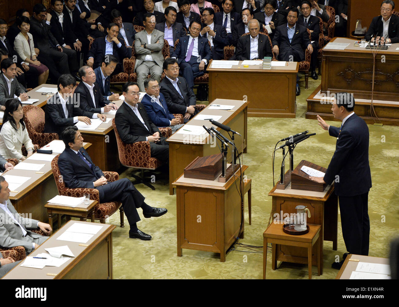 Tokyo, Japan. 11th June, 2014. Banri Kaieda, standing at right, leader of the coalition Liberal ...
