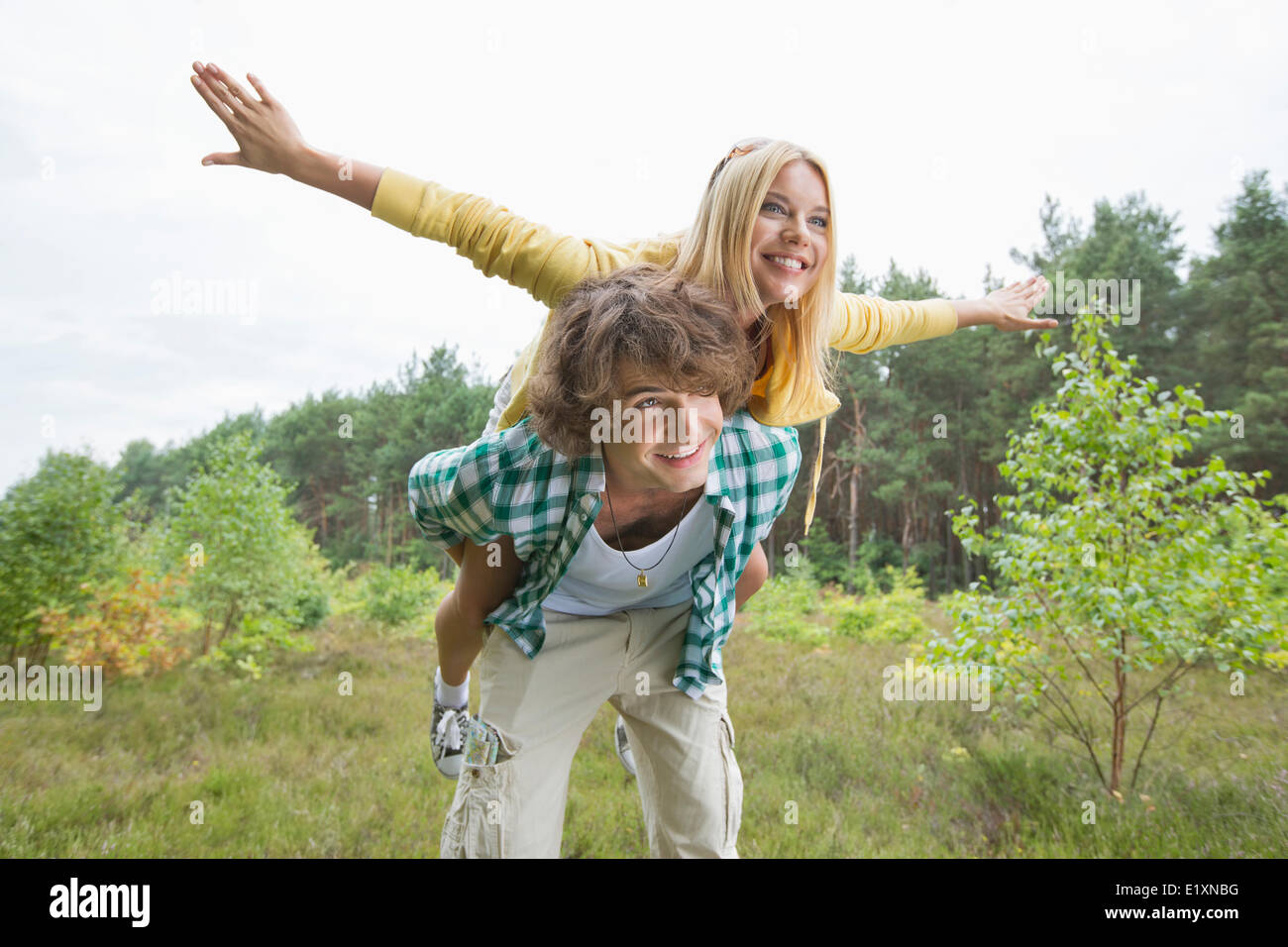 Young couple enjoying ride on hi-res stock photography and images - Alamy