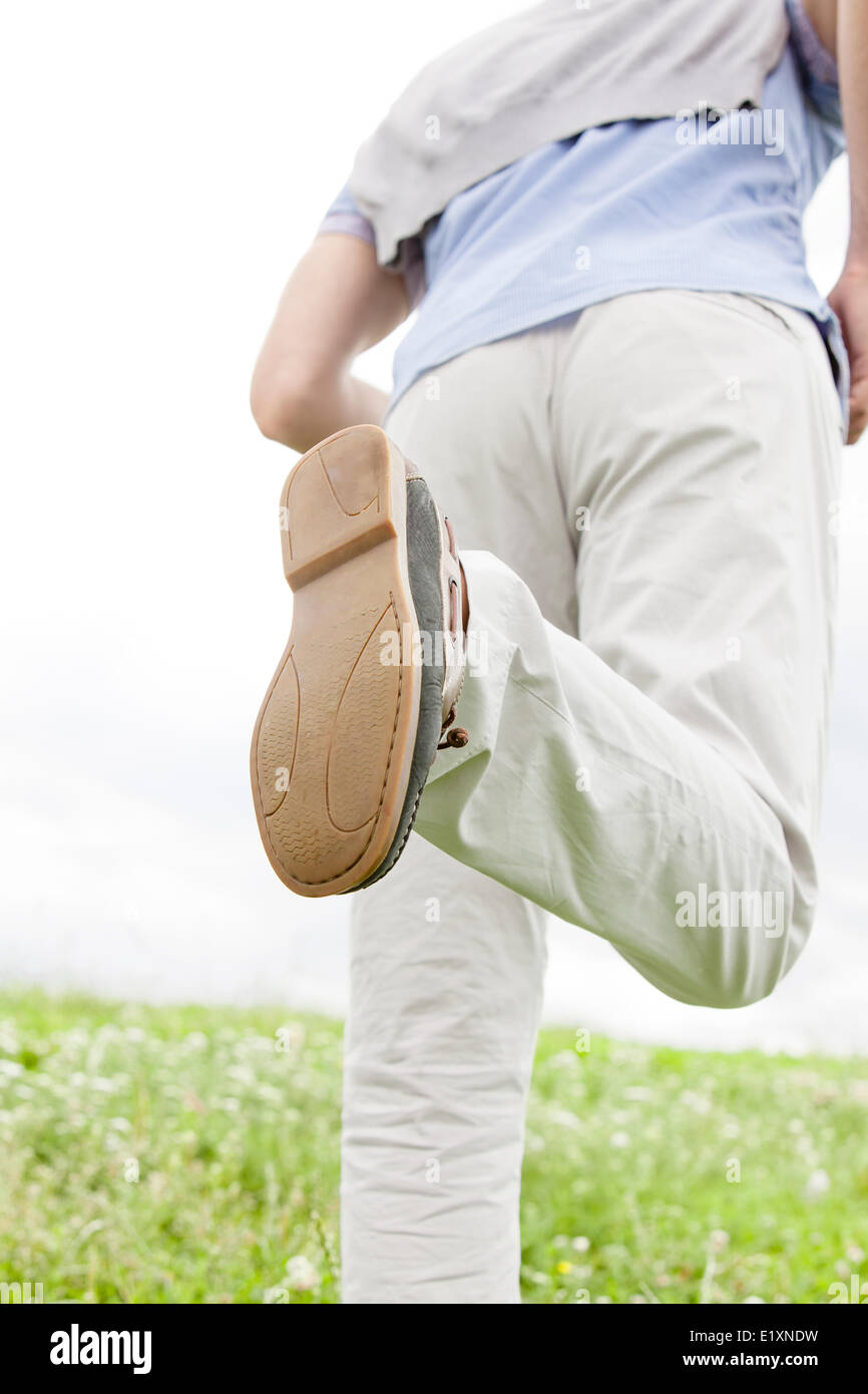 Man running back view one hi-res stock photography and images - Alamy