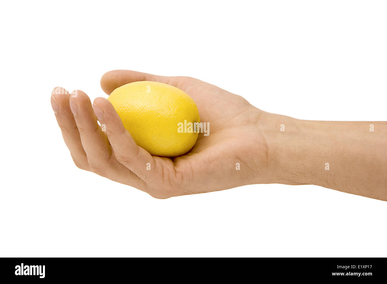 Yellow lemon in a hand Stock Photo - Alamy