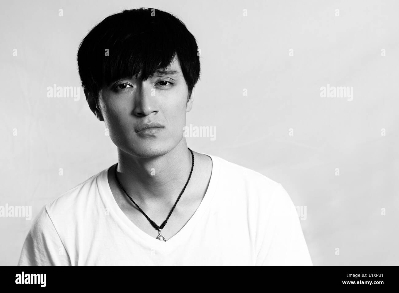 Young man looking sad Stock Photo - Alamy